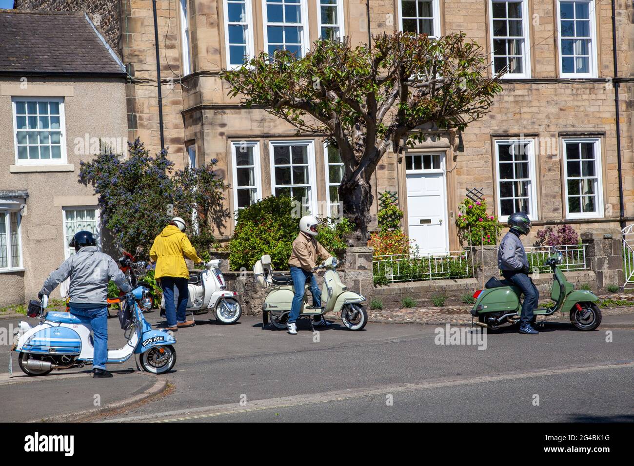 Scooter riders hi-res stock photography and images - Alamy