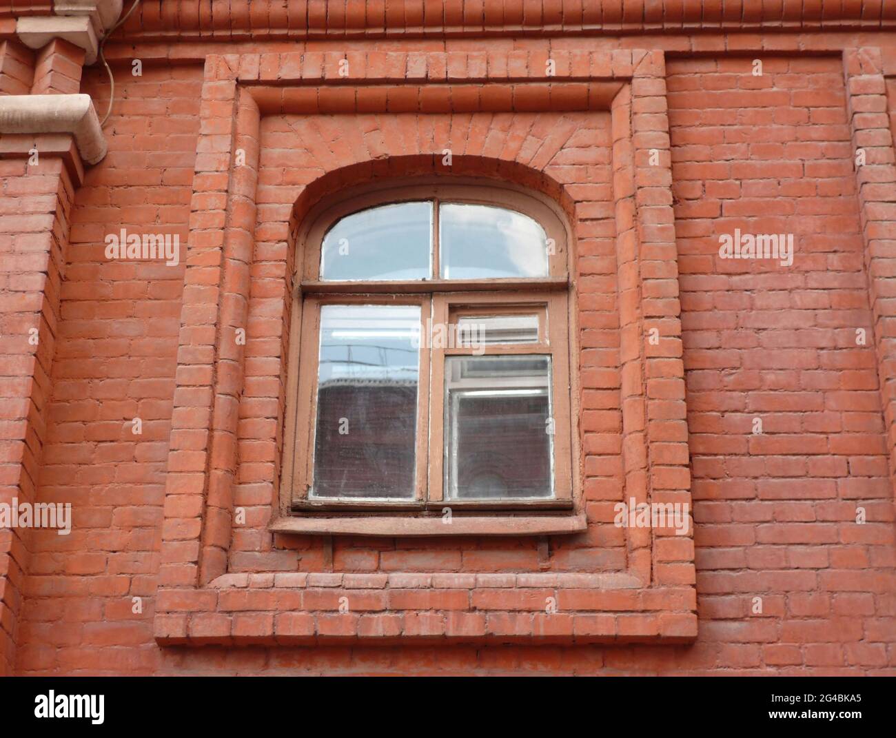 red brick wall with window at day Stock Photo - Alamy