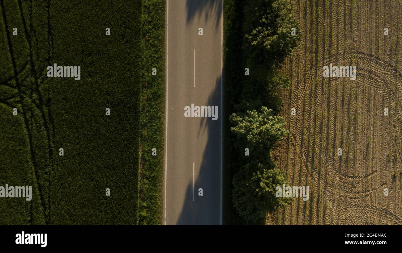 Drone photo of a country road in spring Stock Photo - Alamy