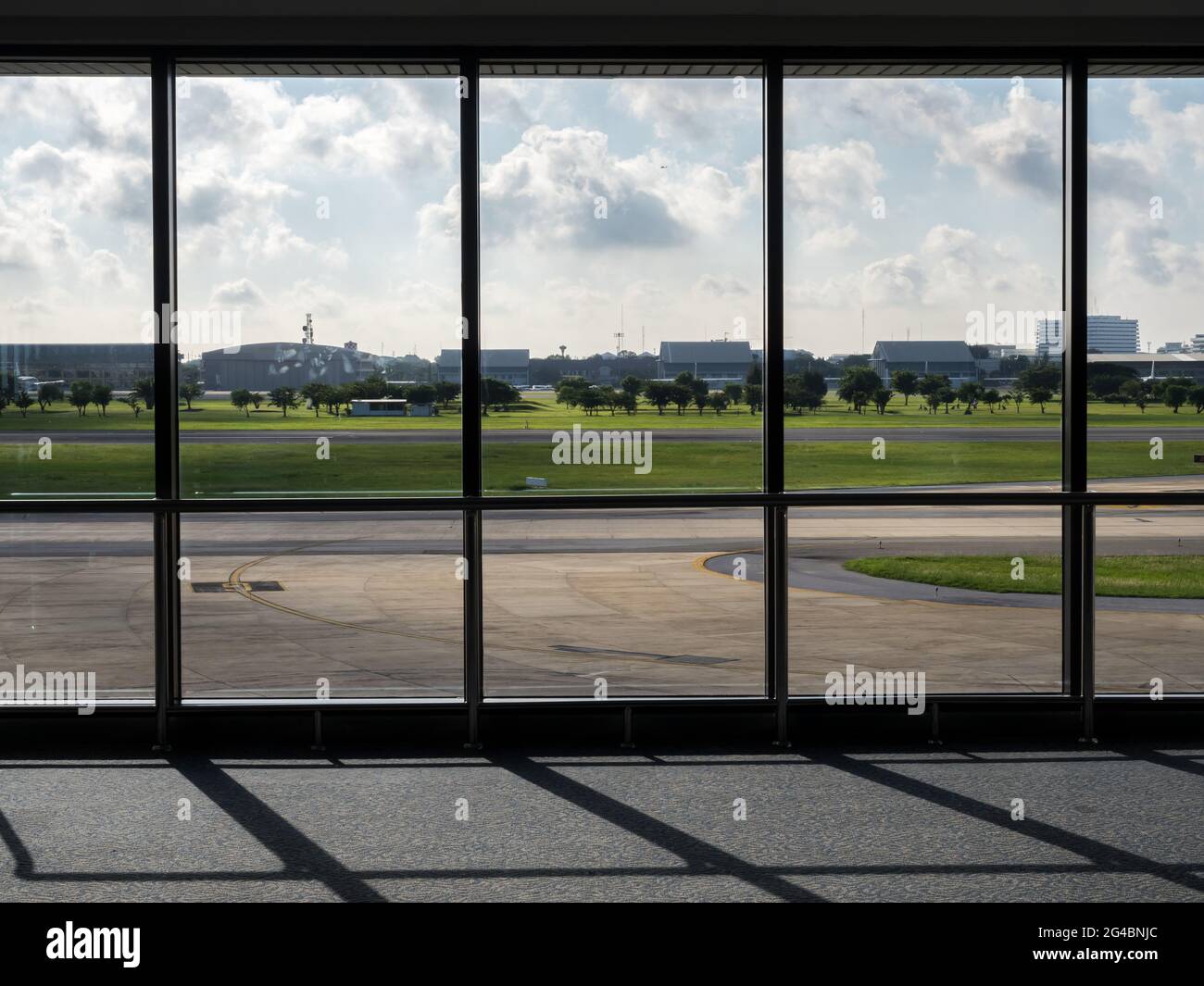 BANGKOK - SEPTEMBER 27: Warm sunlight through mirrors in terminal ...