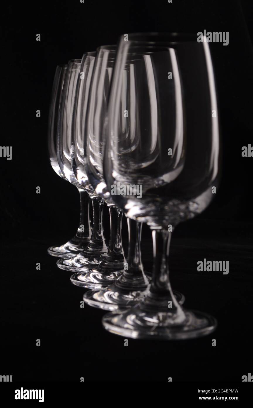 5 glasses aligned showing special visual effect Stock Photo - Alamy