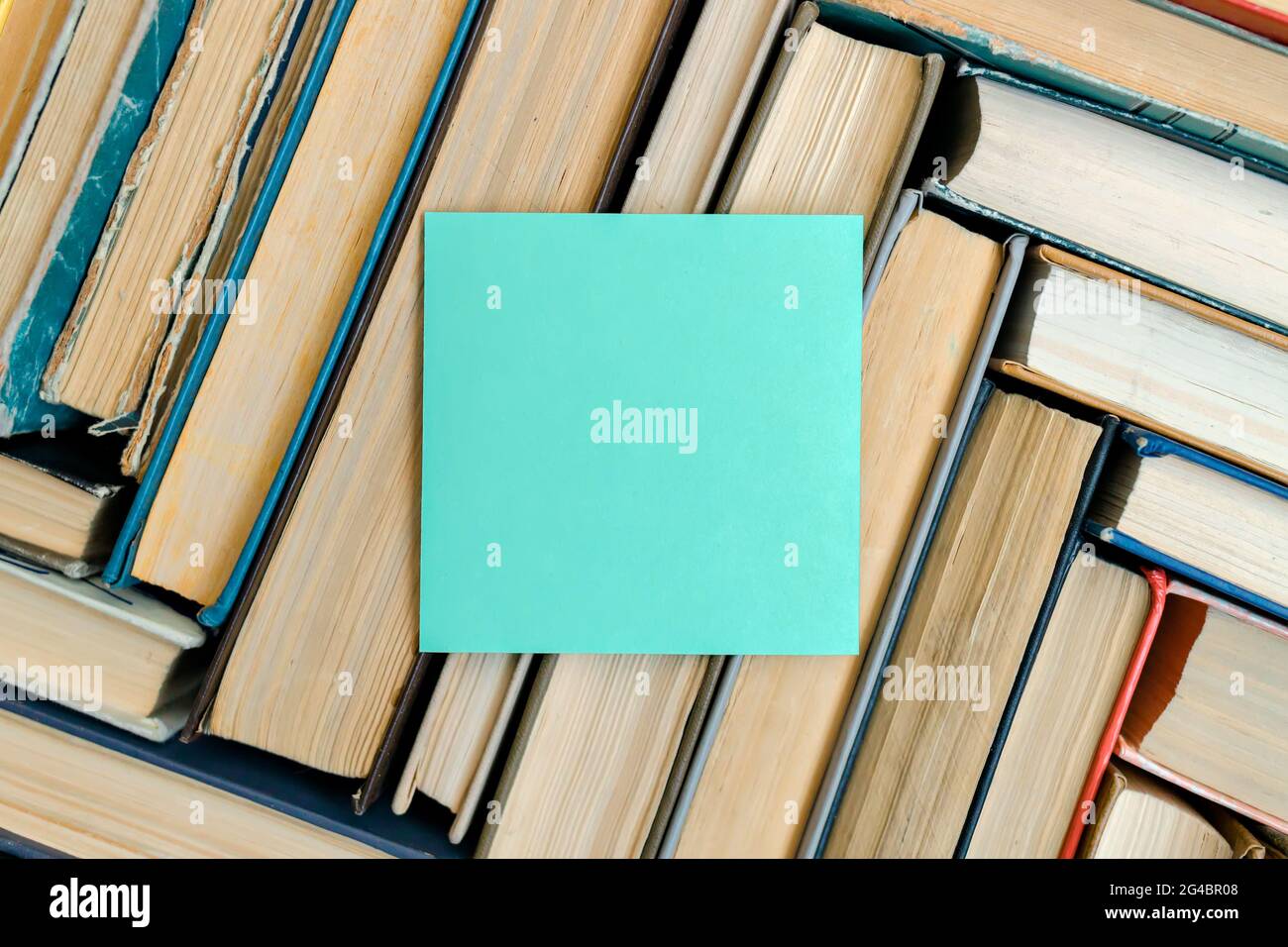 A pattern of old books with a top view. Solid background with copy ...