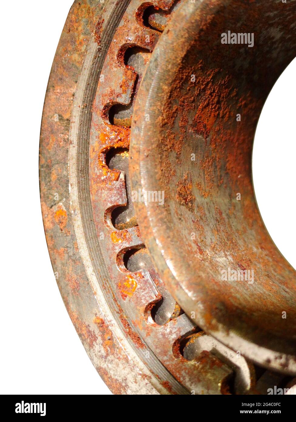 A verticashot of an old rusty ball bearing isolated on white background ...