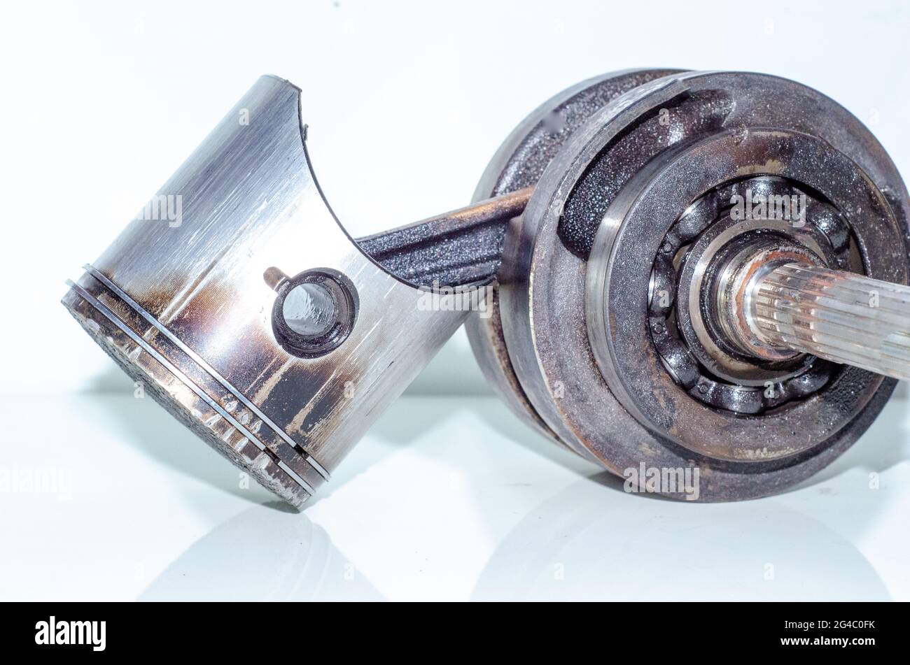 A closeup shot of crankshaft bearing overheating and piston isolated on ...