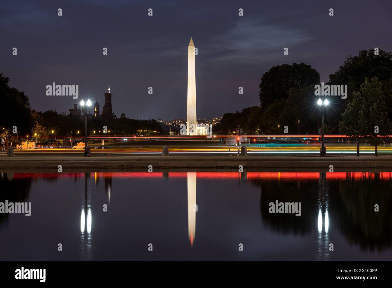 Washington Monument - A night view of Washington Monument reflected in ...