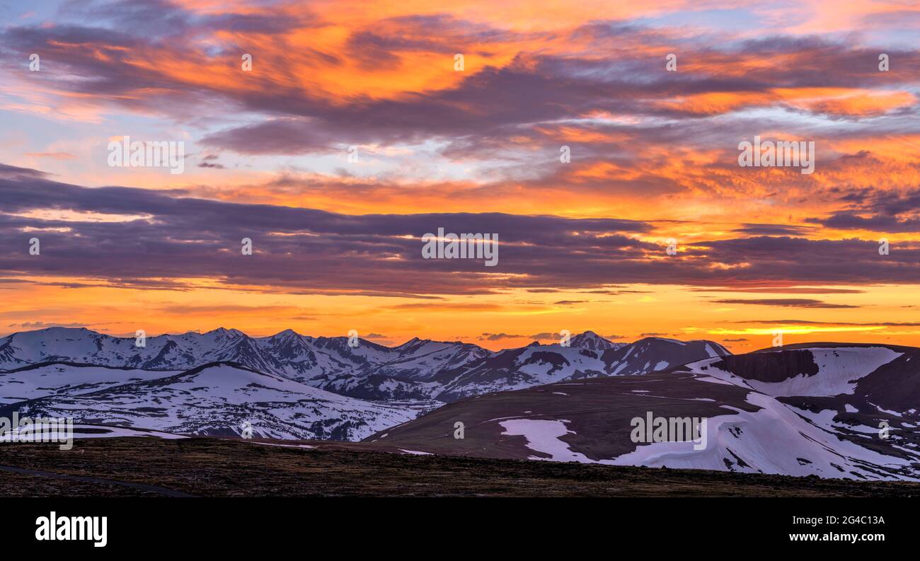 Sunset Spring Rockies - Panorama of colorful Spring sunset clouds over ...