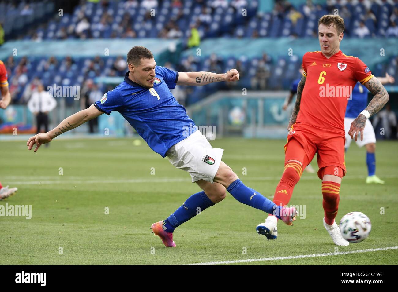 Roma, Italy. 20th June, 2021. Andrea Belotti of Italy and Joseph Rodon ...