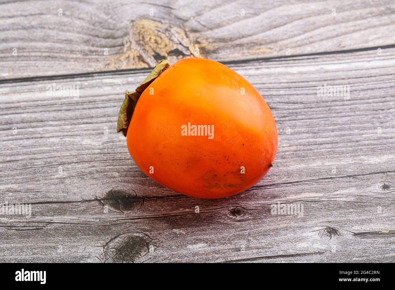 Ripe sweet and tasty persimmon fruit Stock Photo - Alamy