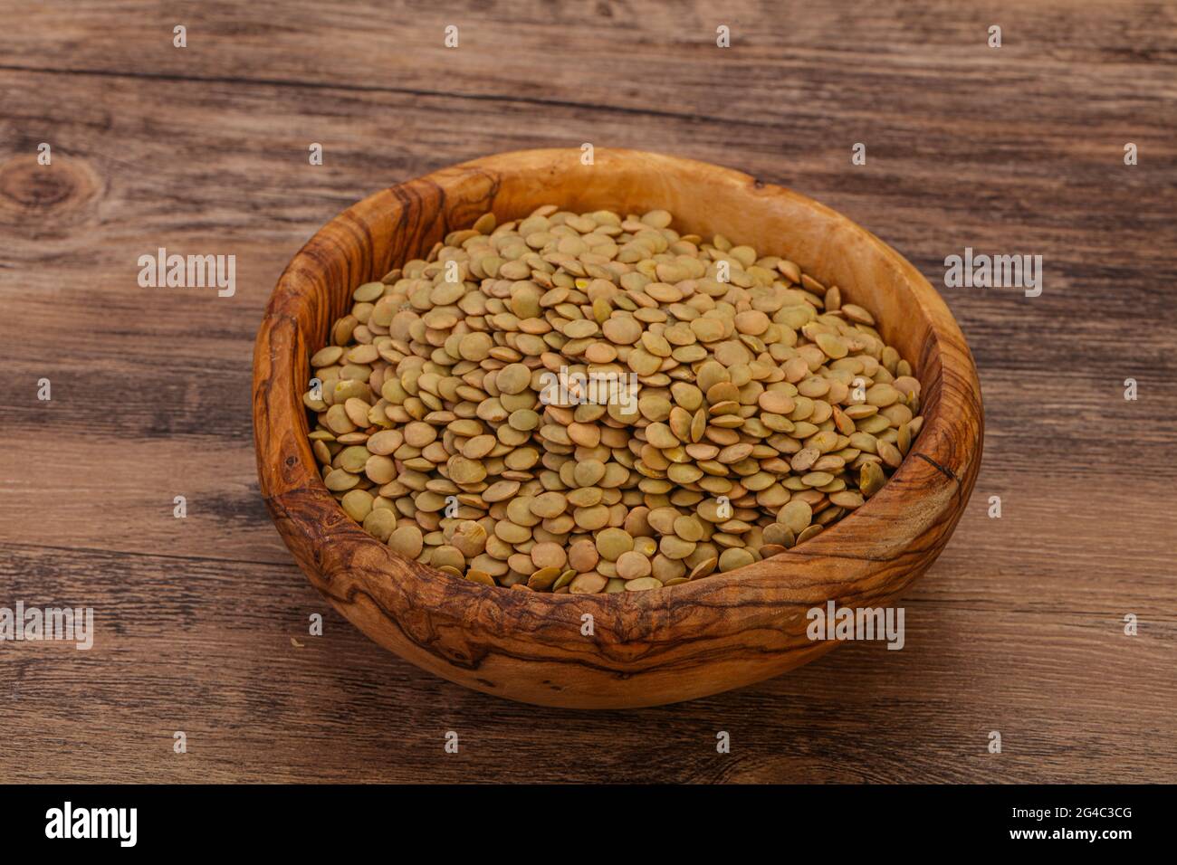 Vegan cuisine - Dry lentil heap isolated Stock Photo - Alamy