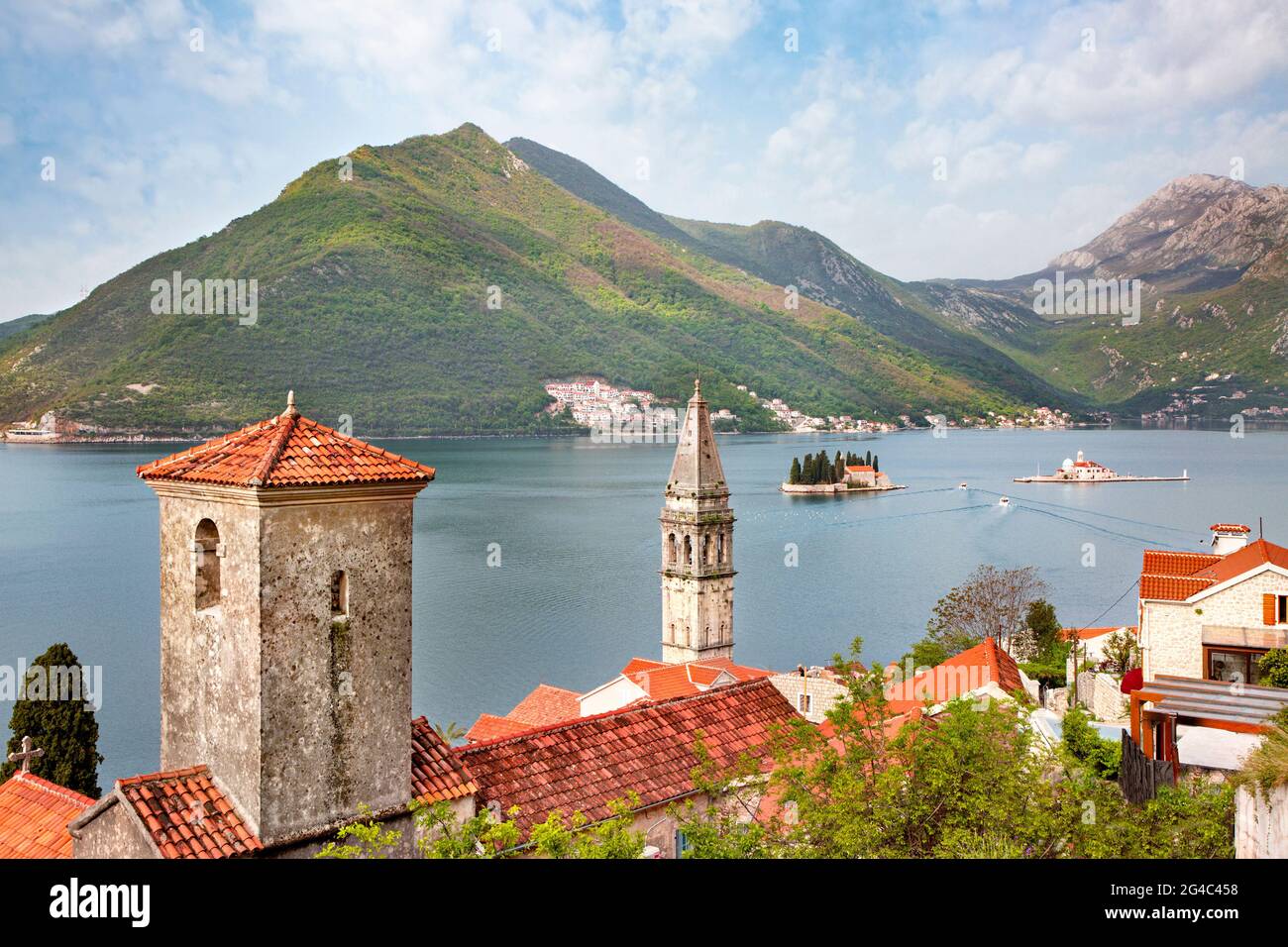 View over the town of Perast with church towers and church islands in ...