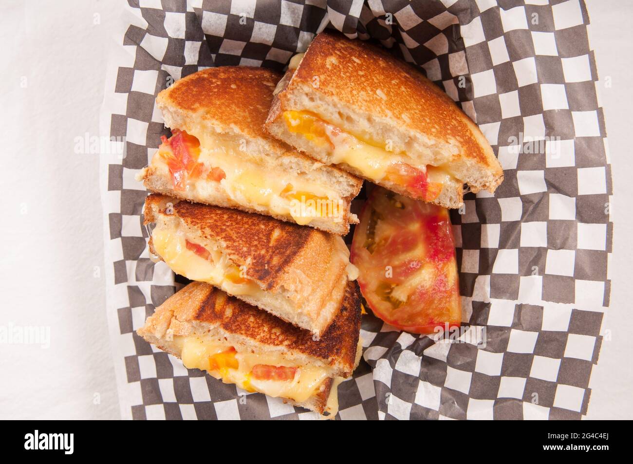 An overhead shot of food truck sandwich of grilled cheese and heirloom ...