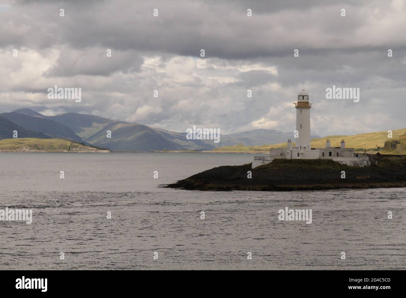 The White Lismore Lighthouse on Eileen Musdile, from the Sound of Mull ...