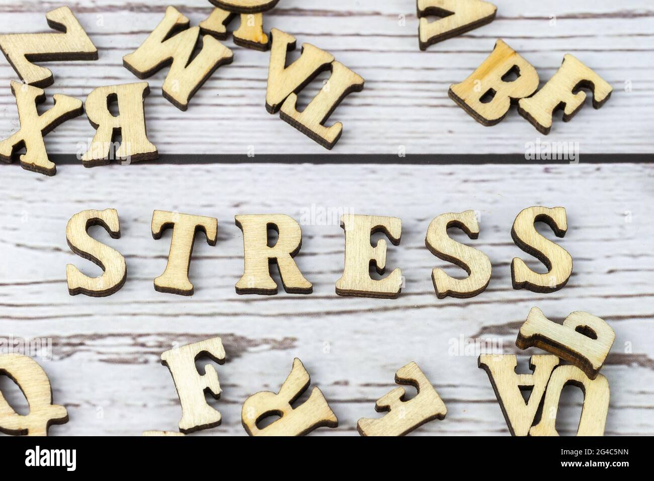 Stress - word from wooden blocks with letters, great worry caused by a ...