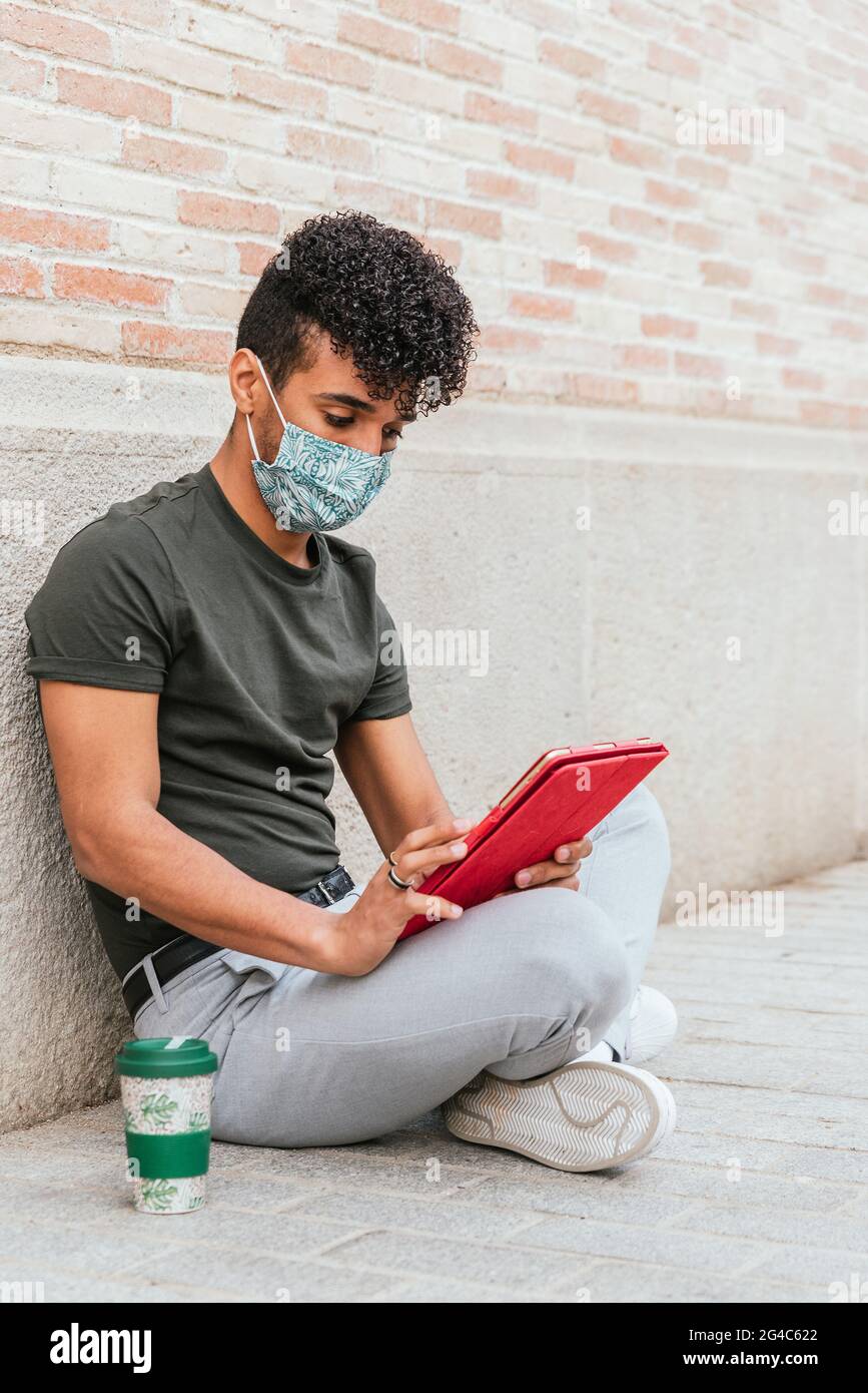 Latin young man mask on hi-res stock photography and images - Alamy