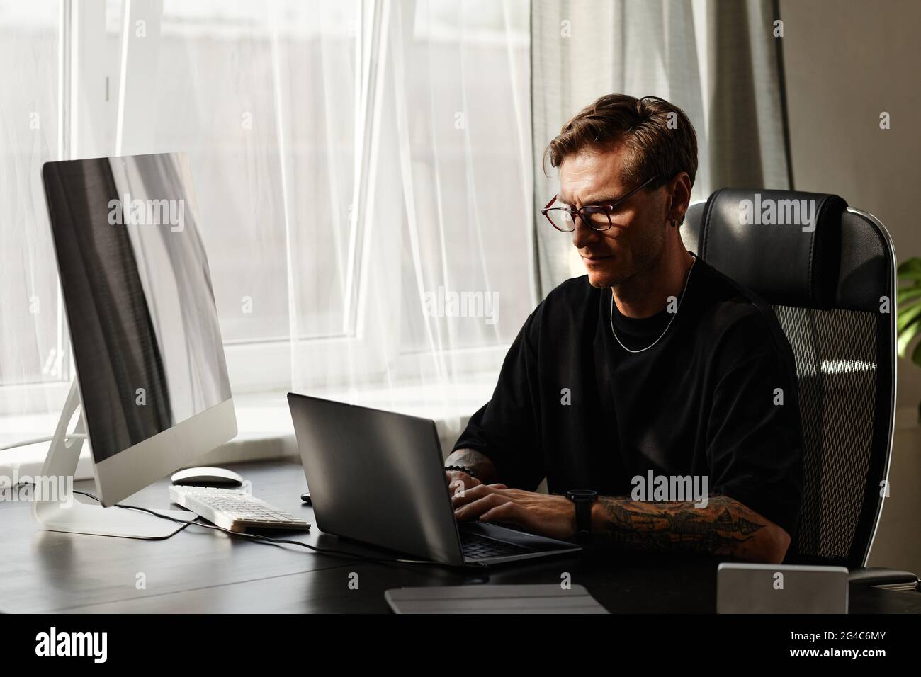 Serious programmer hi-res stock photography and images - Alamy