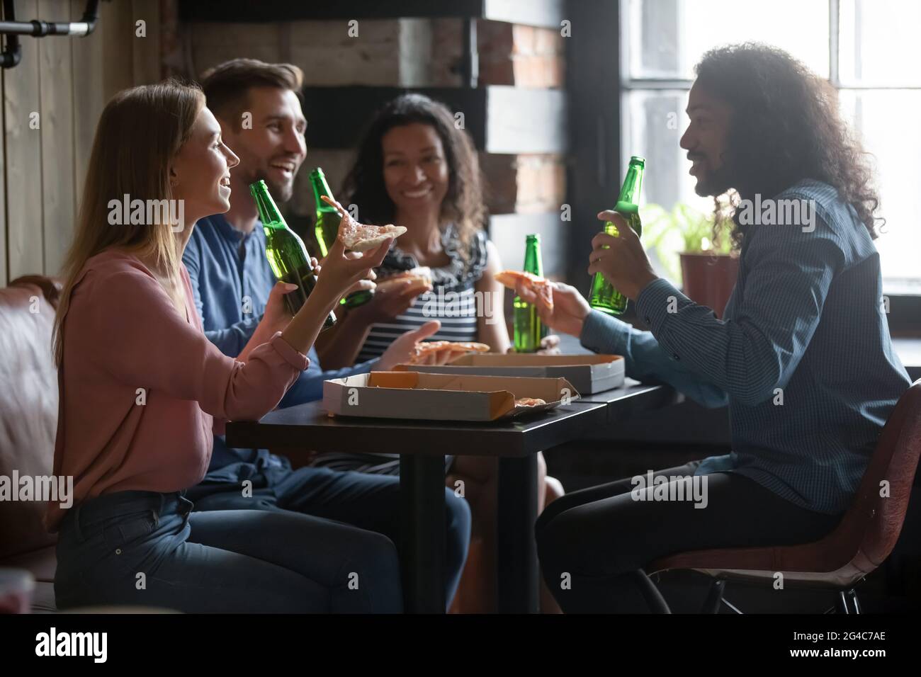 Happy millennial diverse friends spending time together Stock Photo - Alamy
