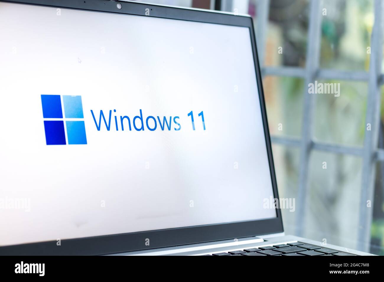 Windows 11 logo on laptop screen stock image Stock Photo - Alamy