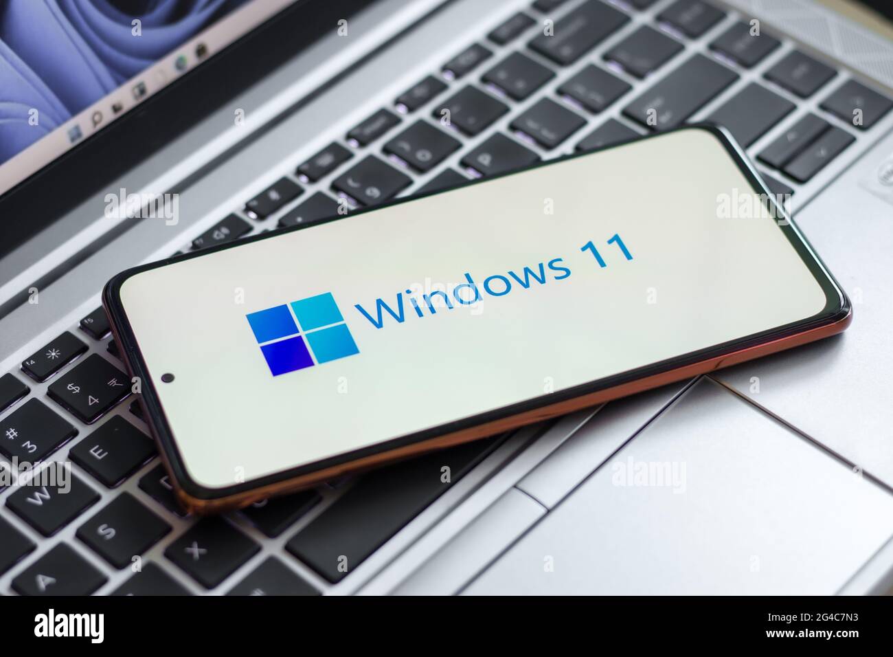 Windows 11 logo on laptop screen stock image Stock Photo - Alamy