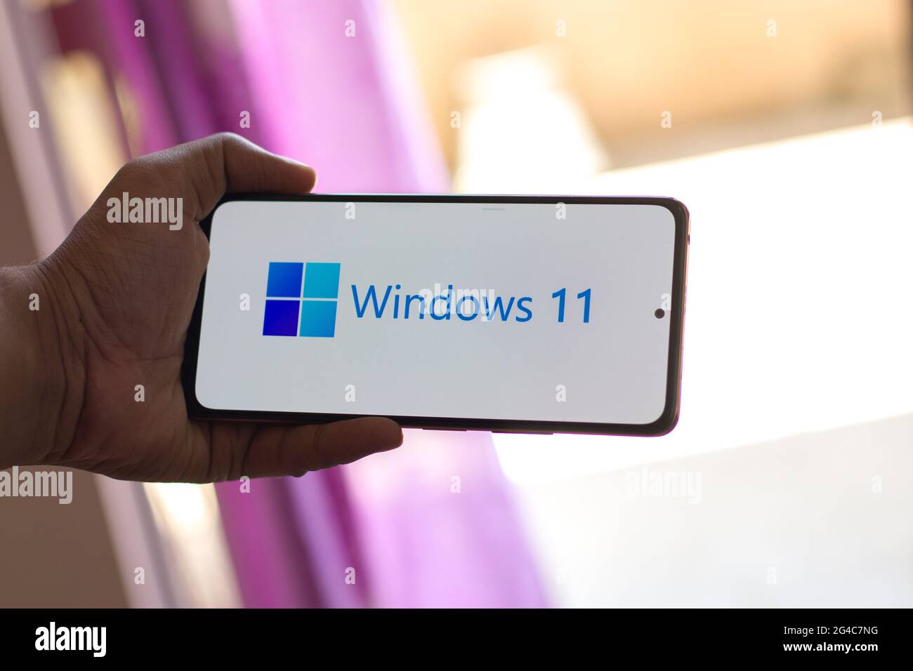 Windows 11 logo on laptop screen stock image Stock Photo - Alamy