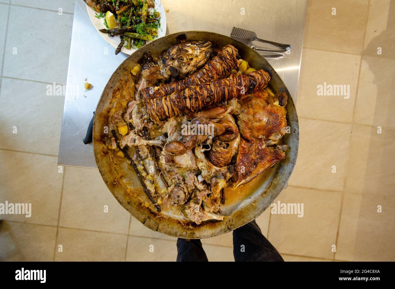 An overhead shot of various meat cooking in a wok Stock Photo - Alamy