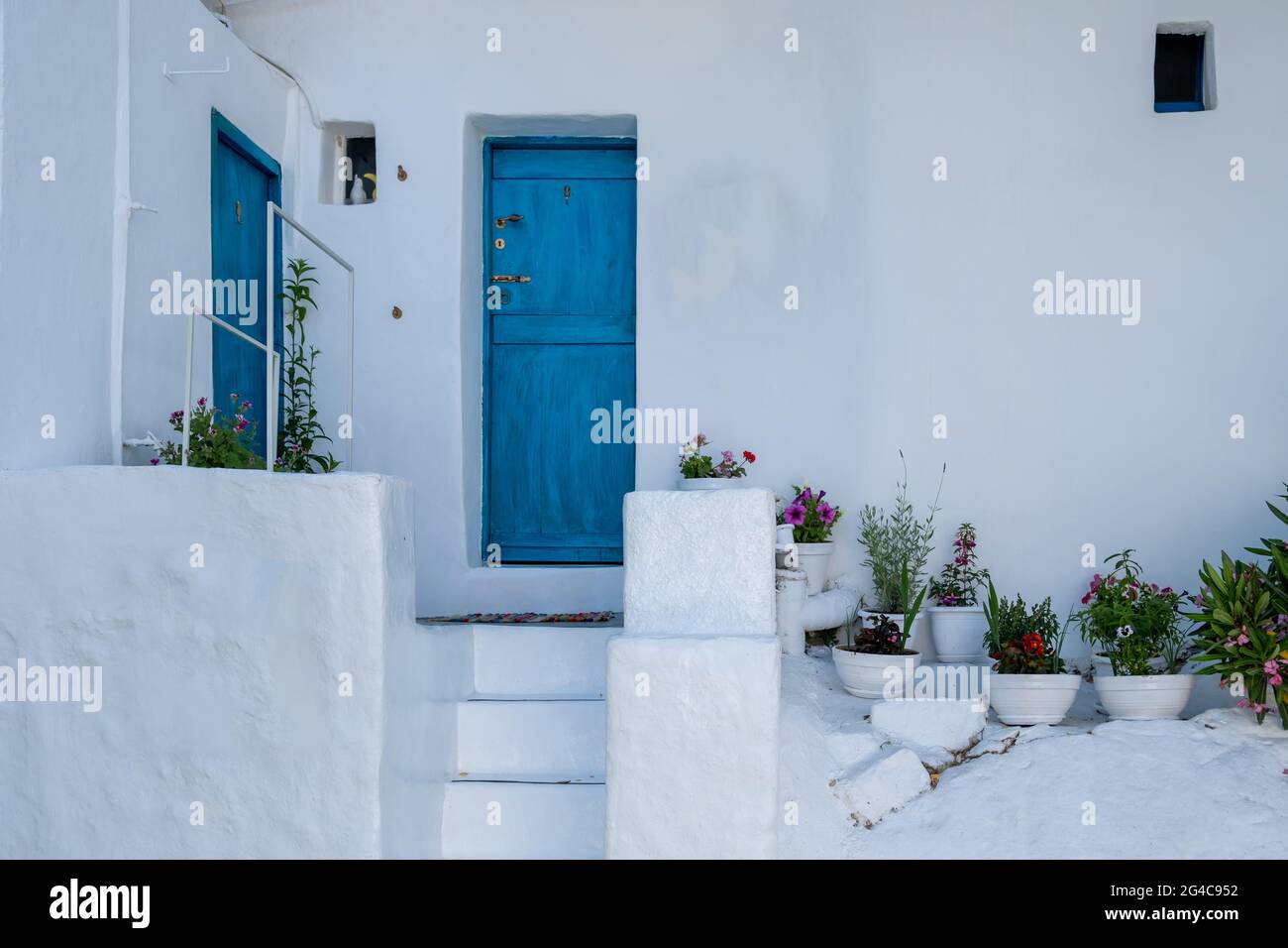Greece with traditional white and blue greek house hi-res stock ...