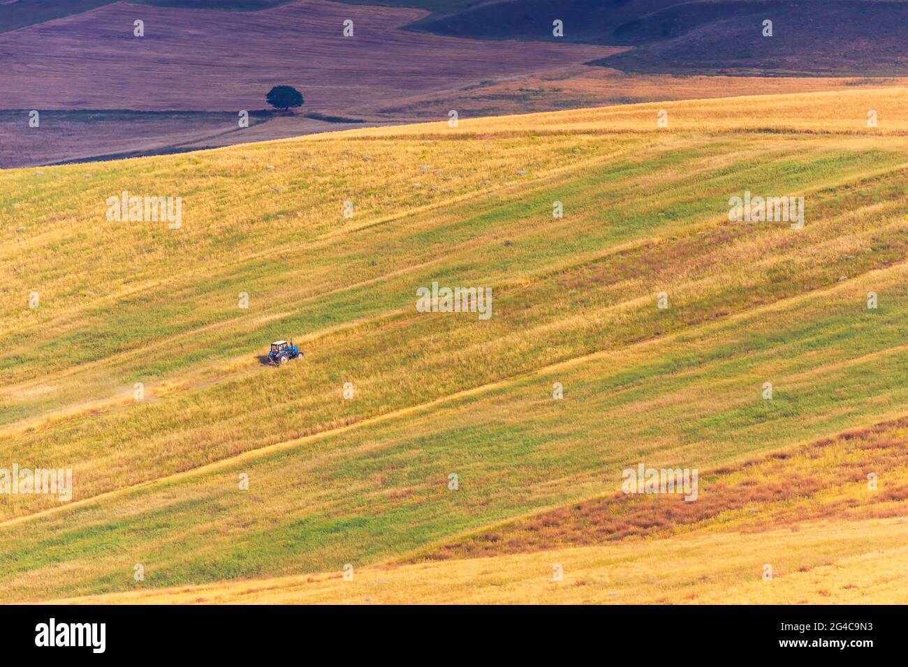 Mountains farming tractor on rural hi-res stock photography and images ...