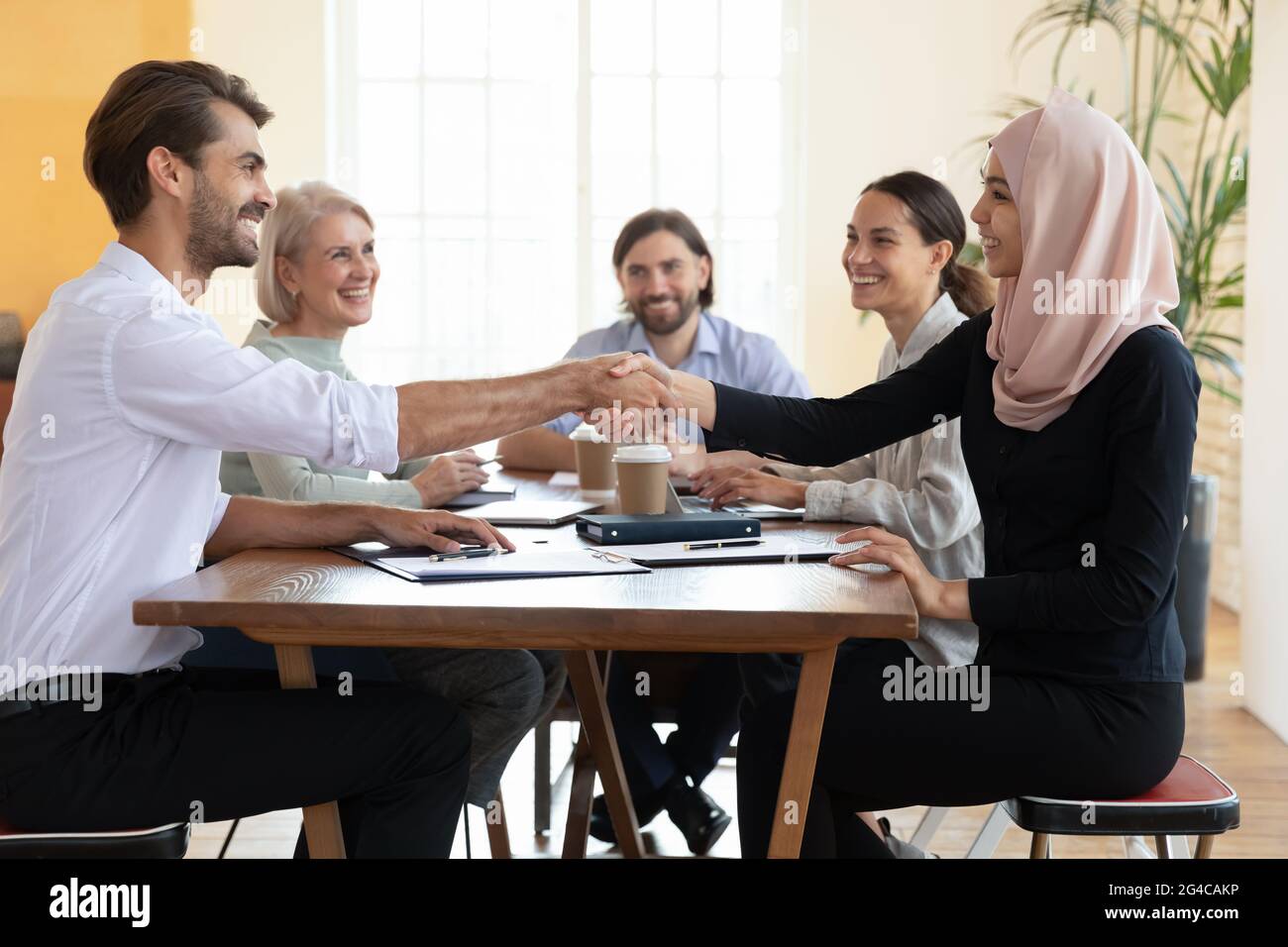 Asian man signing contract hi-res stock photography and images - Alamy