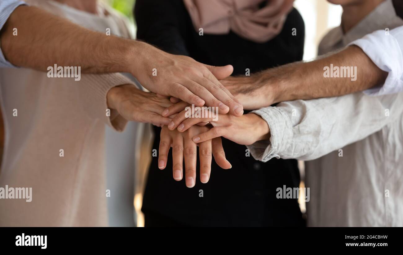 People putting hands up hi-res stock photography and images - Alamy