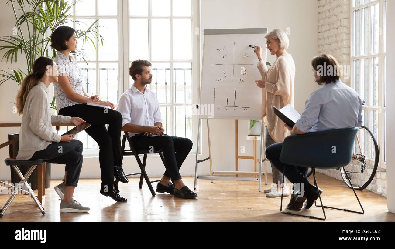 Middle aged man with report hi-res stock photography and images - Alamy