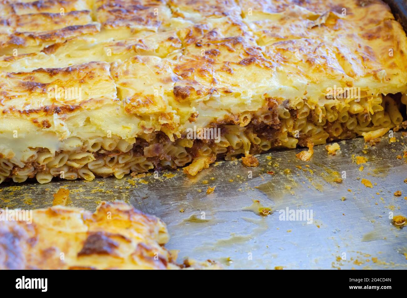 A closeup shot of pastitsio on a tray pan Stock Photo - Alamy