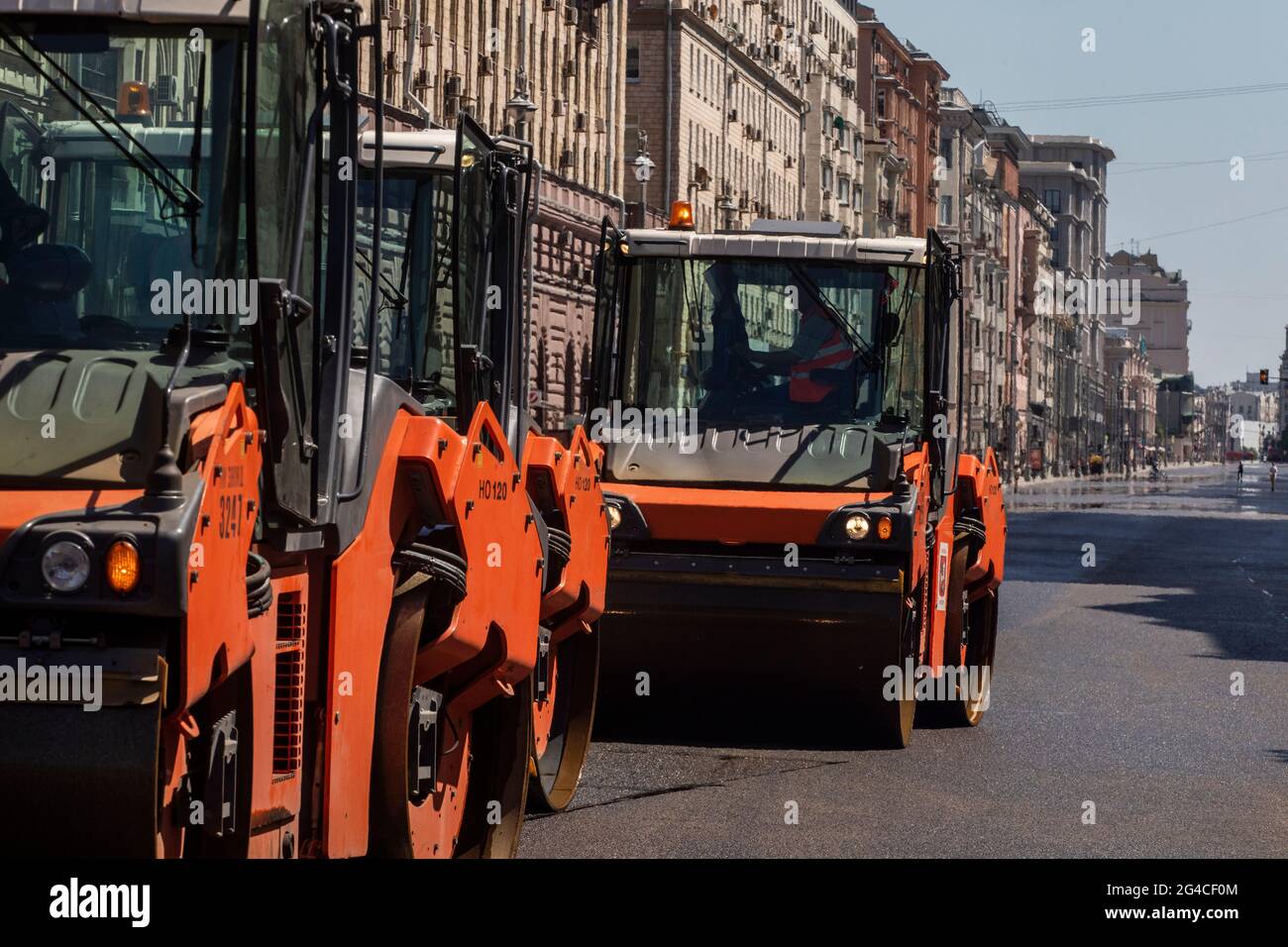 Moscow, Russia. 20th of June, 2021 Road workers are laying a new ...