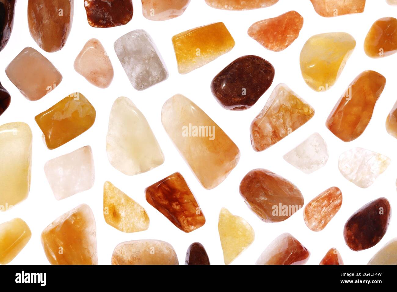 Red silk jade rare jewel stones texture on white light isolated ...