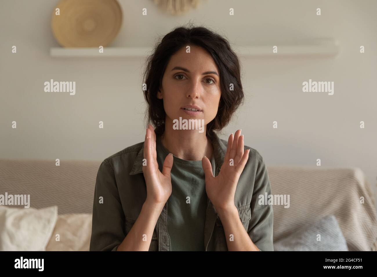 Head shot portrait of woman speaking at camera, video call Stock Photo ...