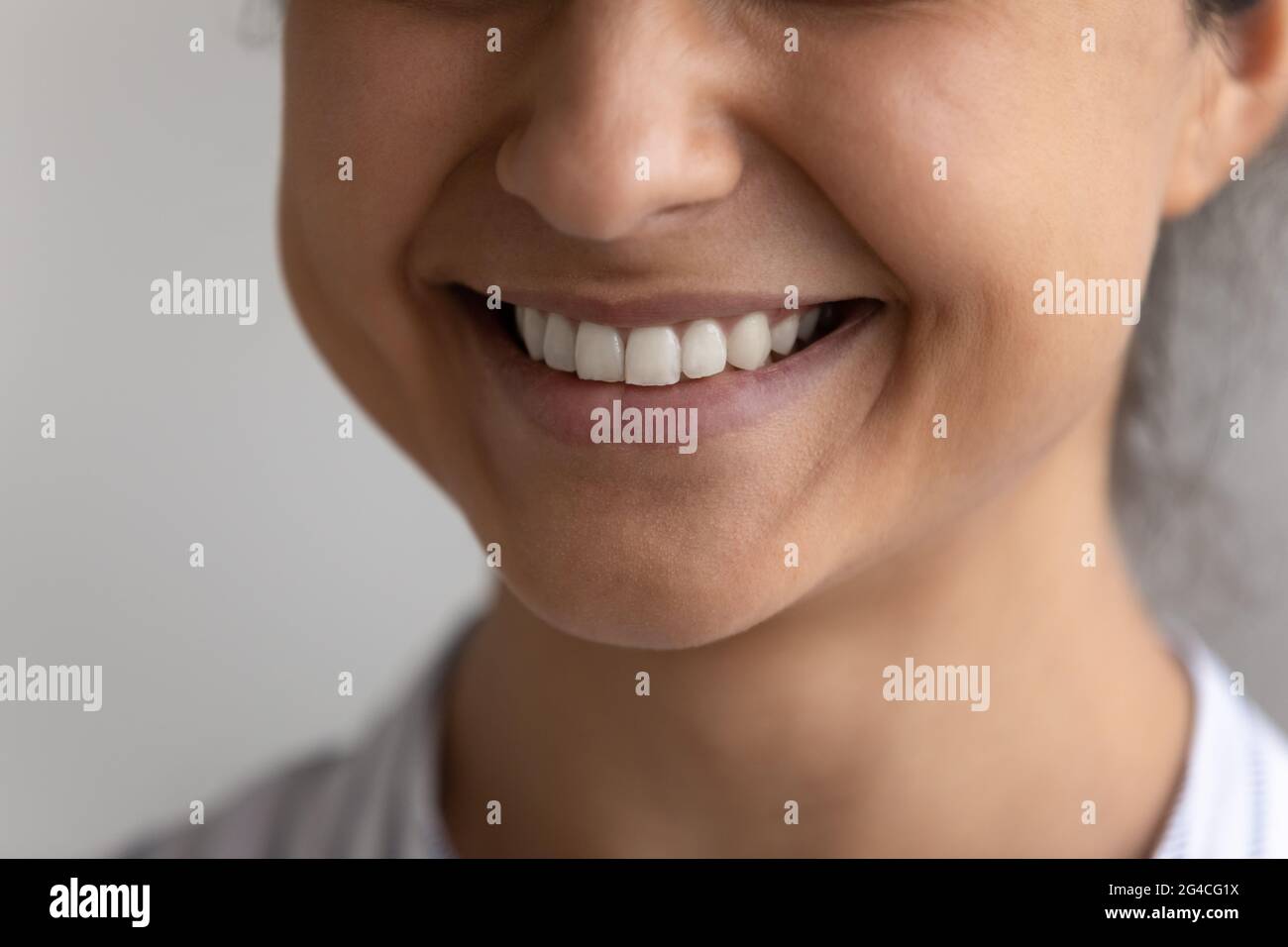 Close up of smiling Indian woman show white healthy teeth Stock Photo ...
