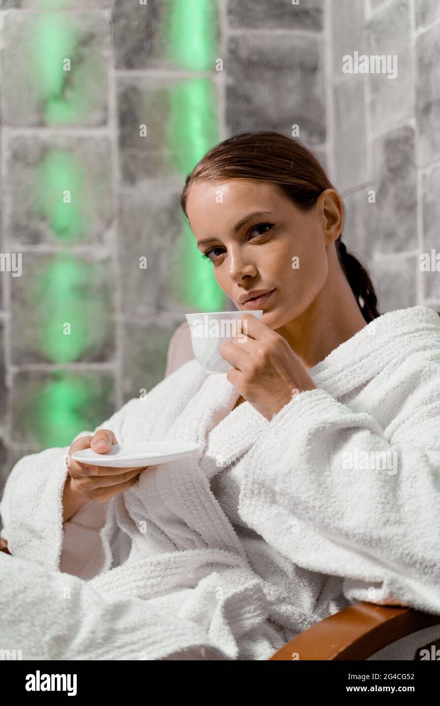 Woman in salt room relax. Inhalation therapy in salt room in spa Stock ...