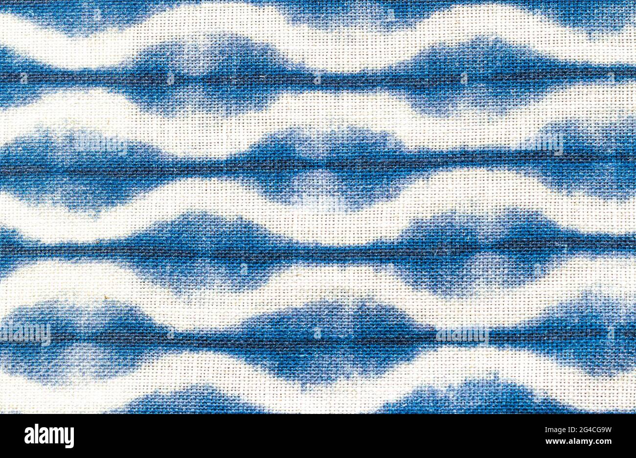 Blue and white fabric with wavy design. Textile texture background ...