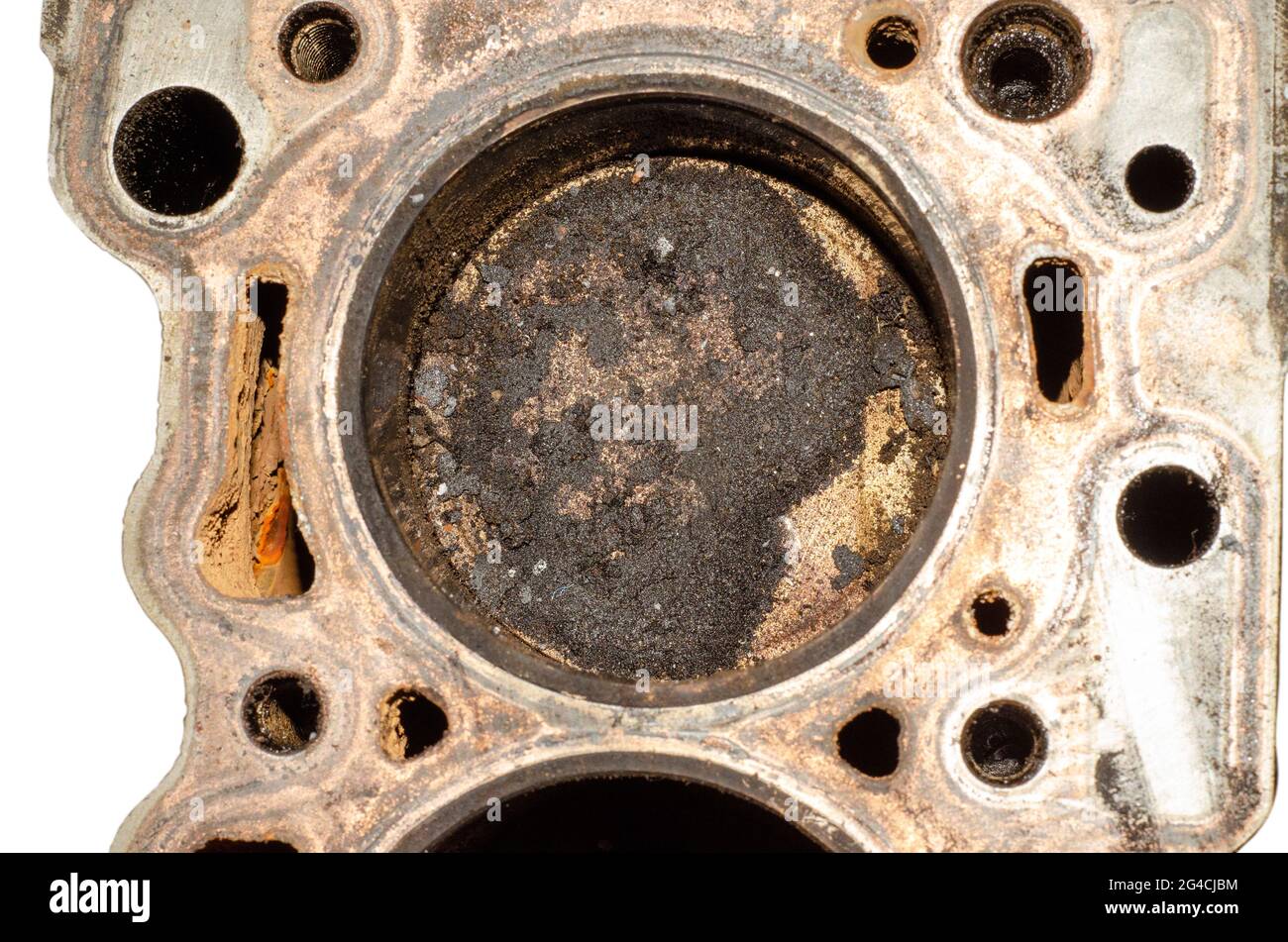 A closeup shot of rusty weathered cylinder and piston isolated on white ...