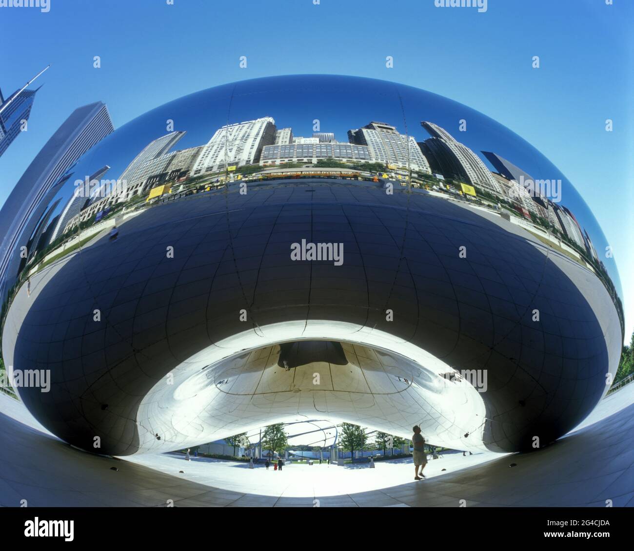 2010 HISTORICAL MAN STANDS UNDER CLOUD GATE SCULPTURE (©ANISH KAPOOR ...