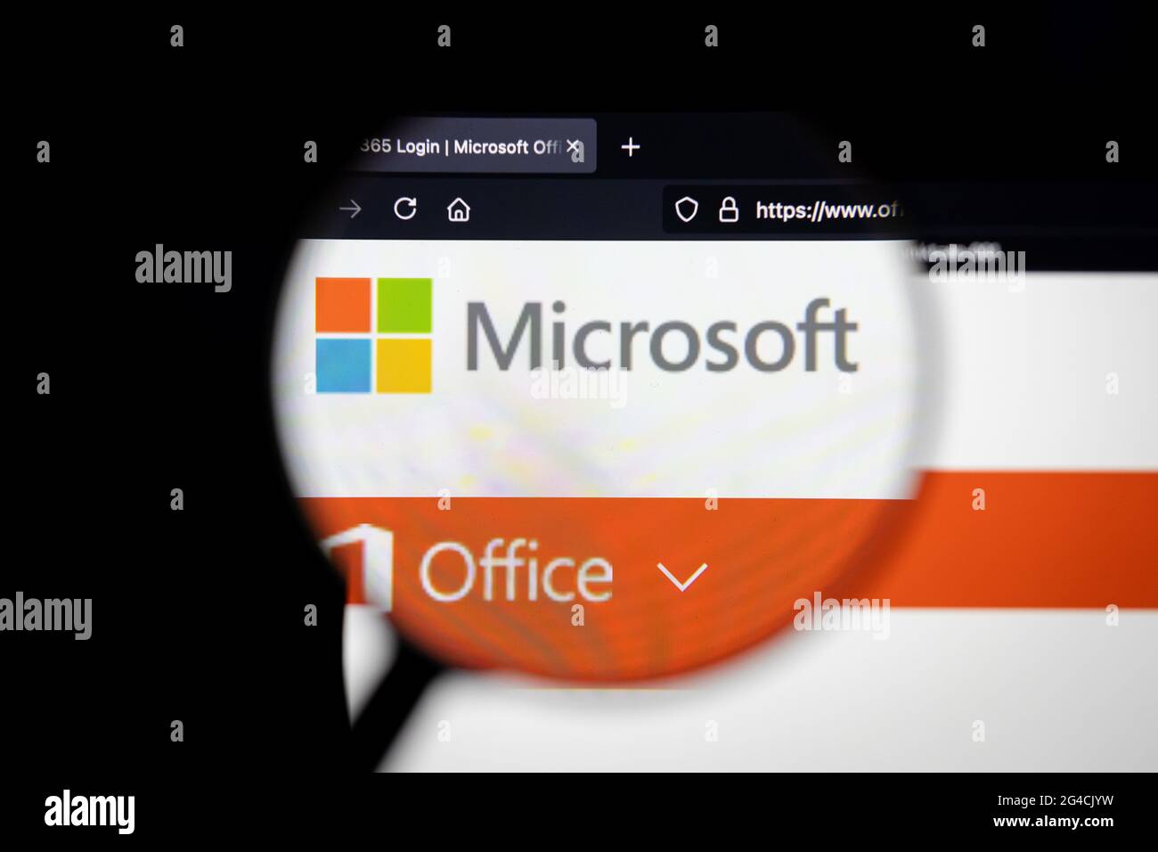 Microsoft company logo on a website seen on a computer screen through a ...