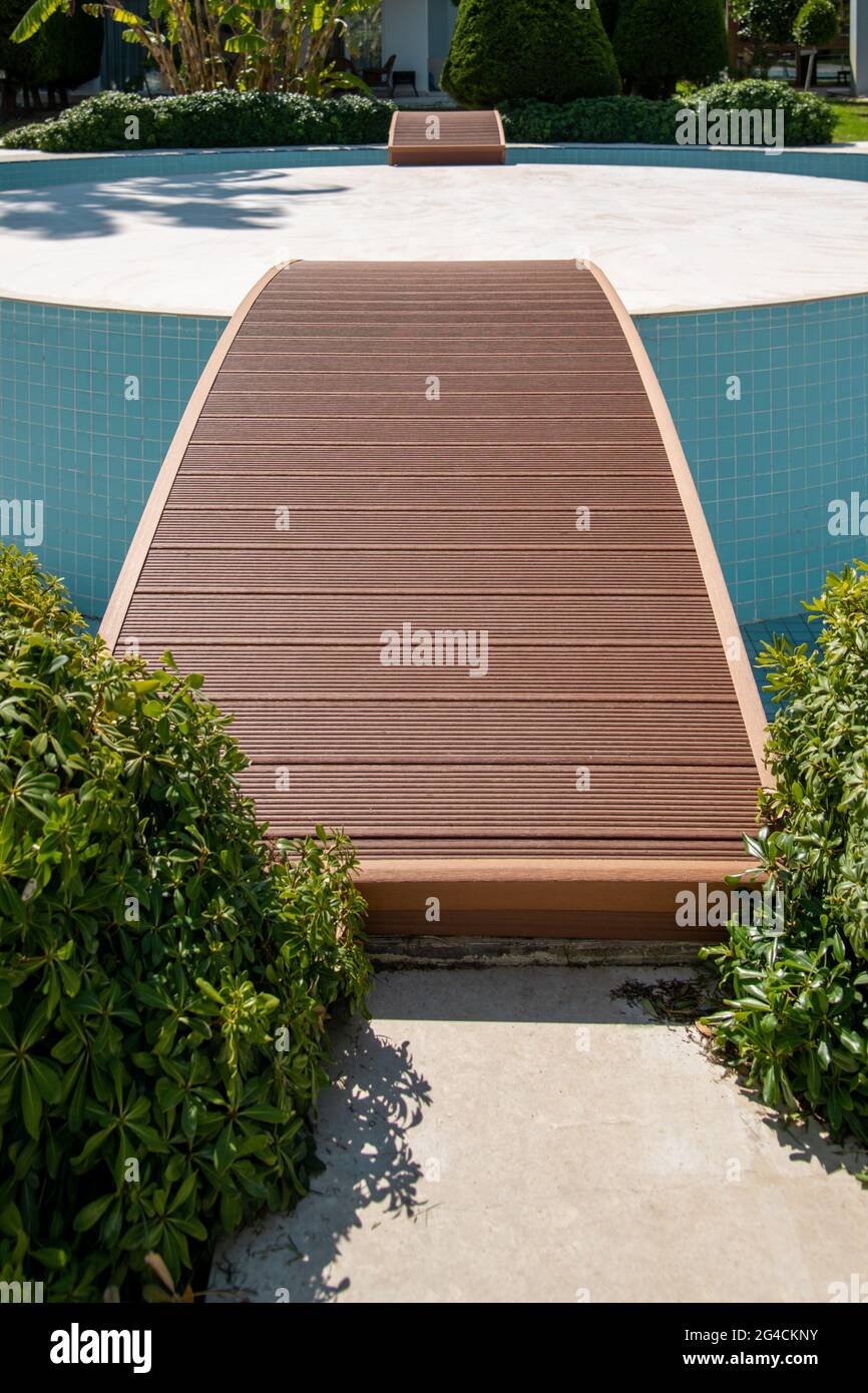 Wooden bridge over swimming pool hi-res stock photography and images ...