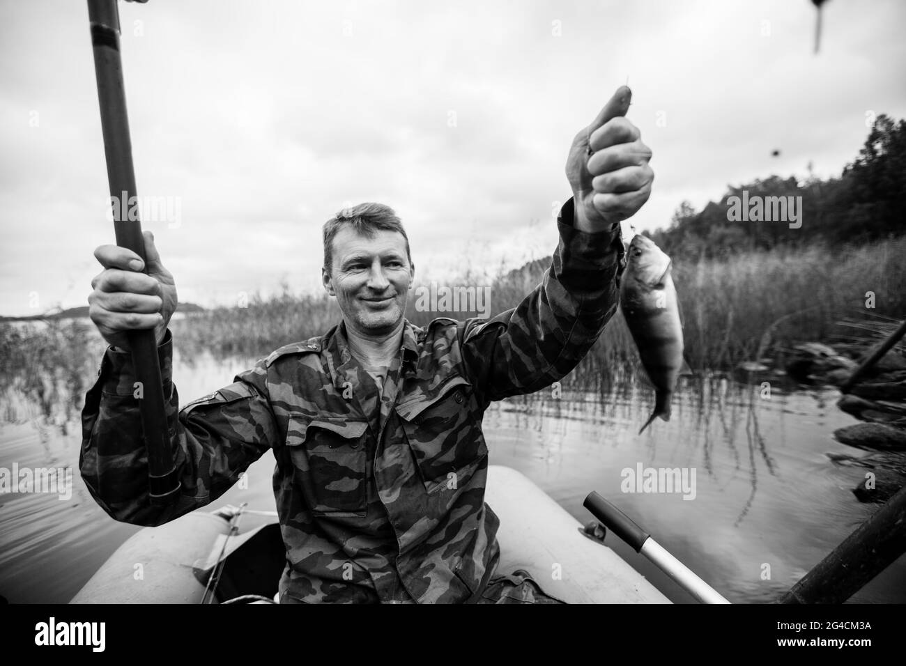 Person in white camouflage Black and White Stock Photos & Images - Alamy