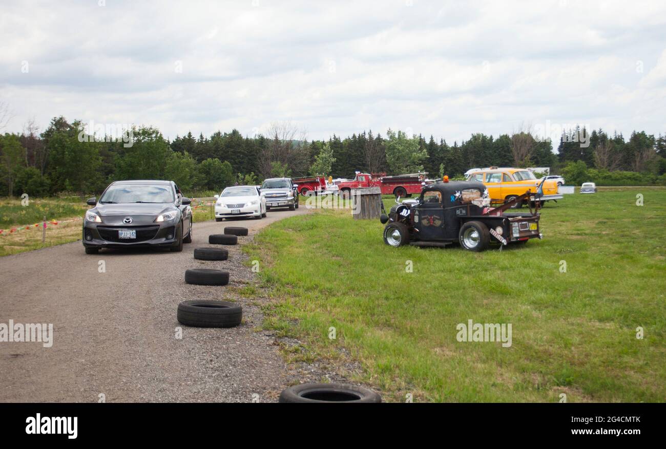 Monster trucks on cars hi-res stock photography and images - Alamy