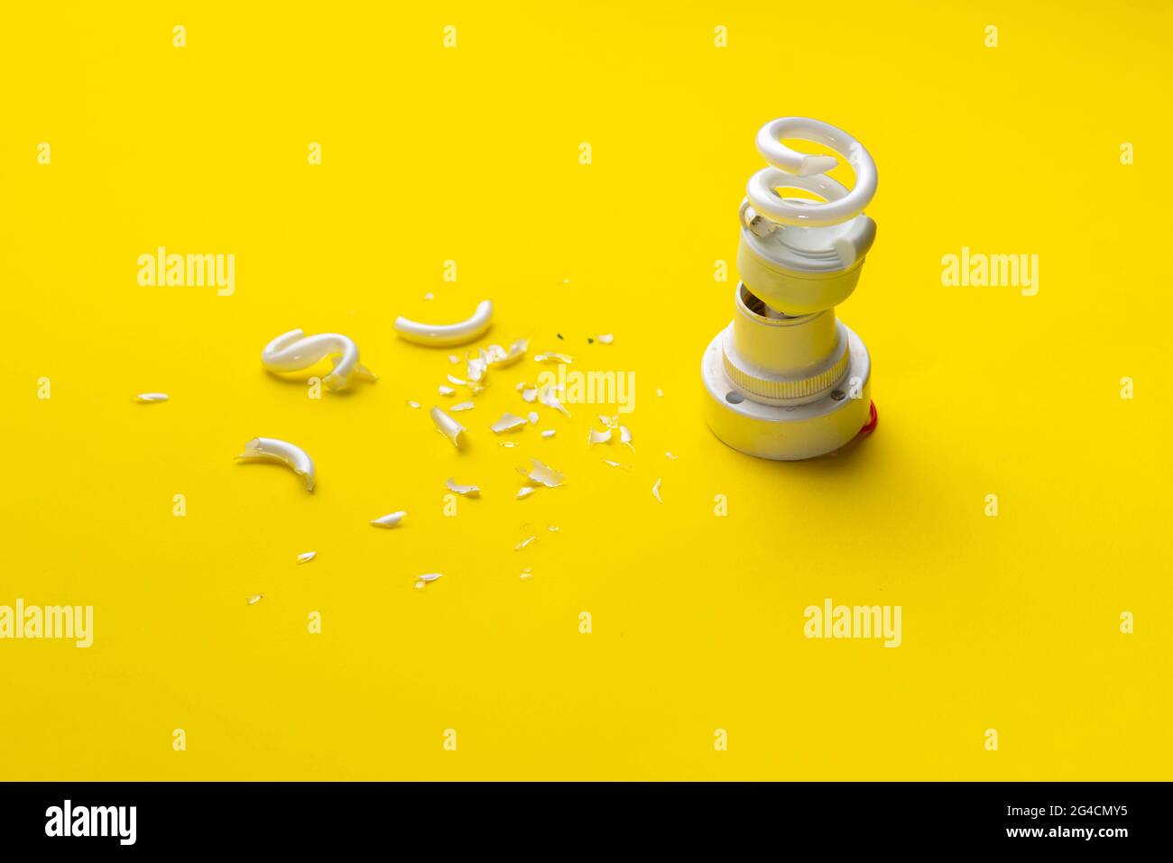 a broken crashed light bulb isolated, a concept of business problem and ...