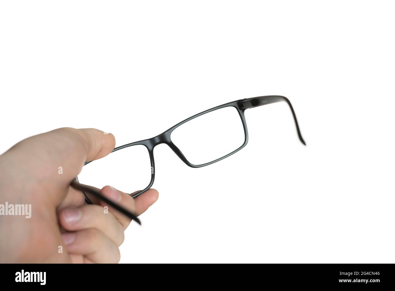 isolated on white person's hand holding a eyeglasses, mockup design ...