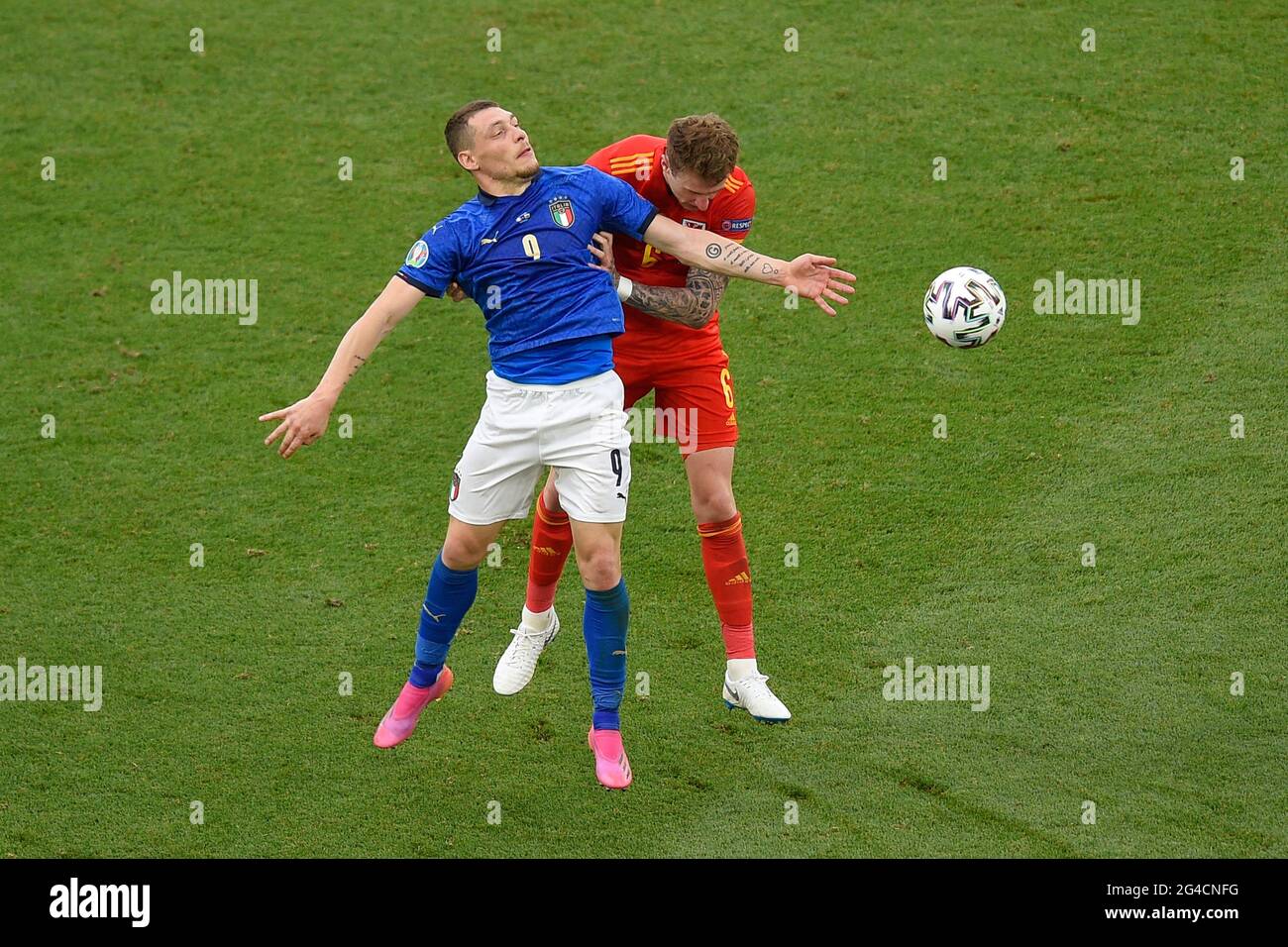 Andrea Belotti of Italy and Joseph Rodon of Wales during the match ...