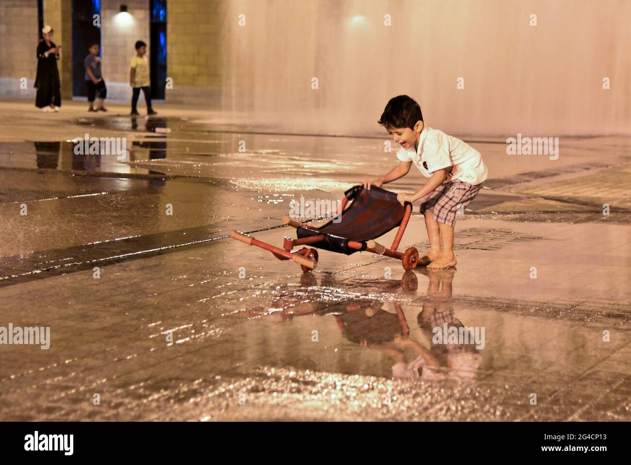 Splash pad at night hi-res stock photography and images - Alamy