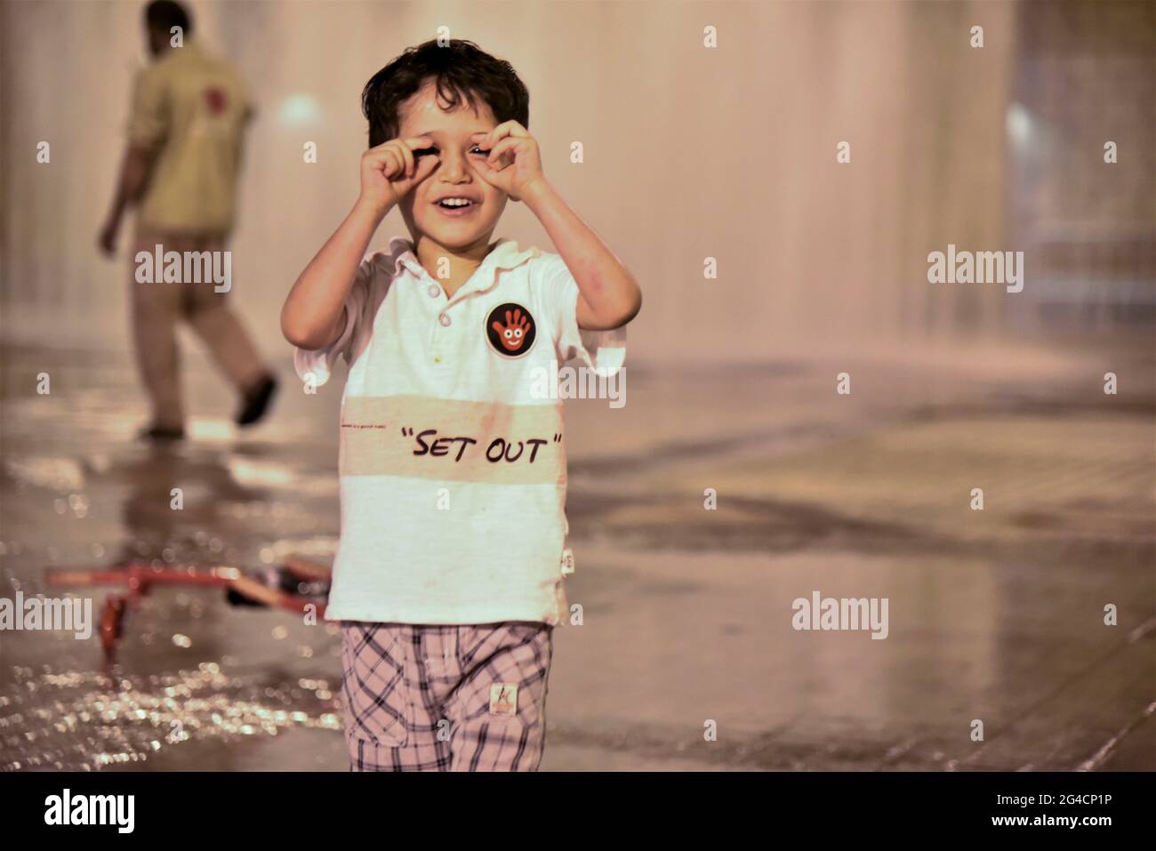 Riyadh, Saudi Arabia. 20th June, 2021. A child plays at a splash pad on ...
