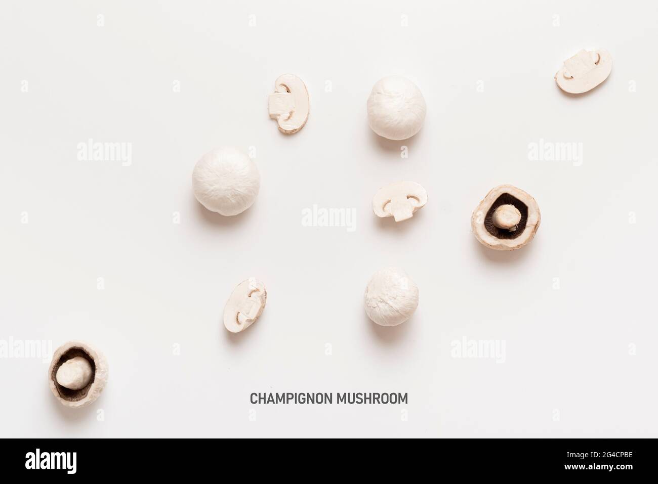simple mushroom champignon, raw sliced pieces, creative flat lay layout ...