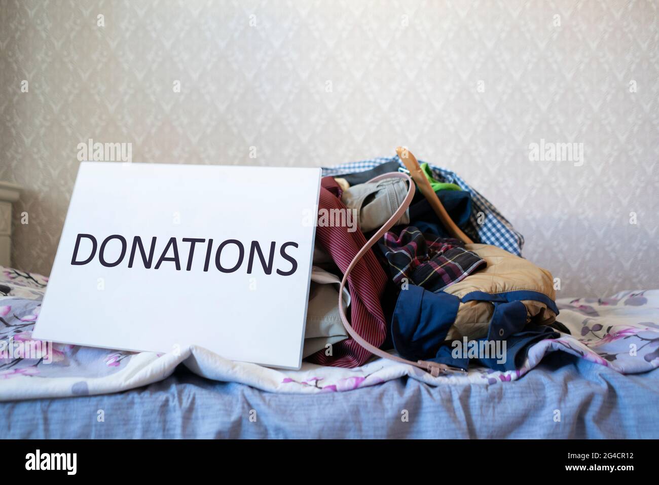 a bunch of clothes for donation to children from poor countries Stock ...