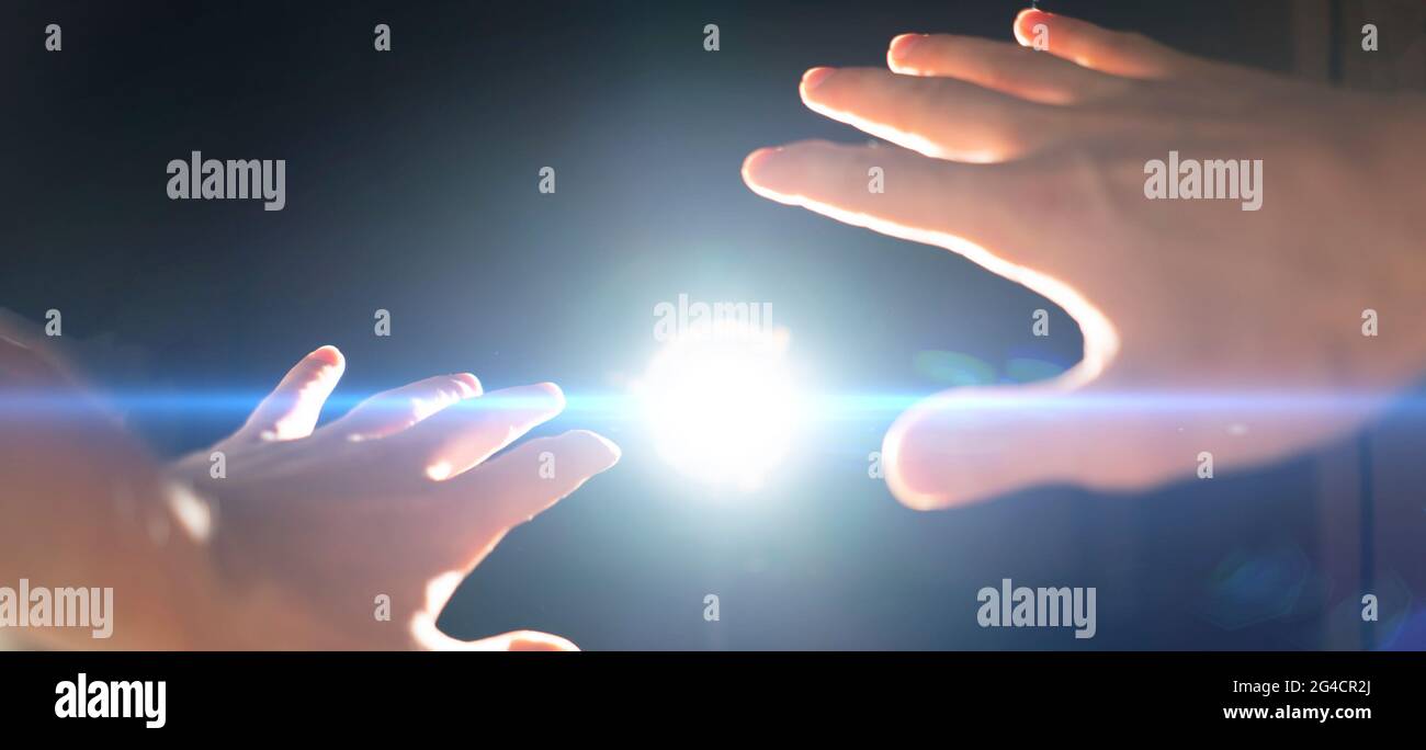 person hand cover himself from the light strike in the dark night ...